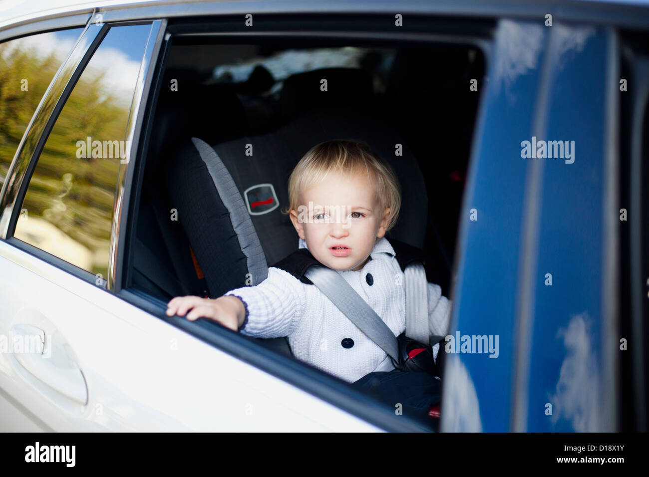 Boy in car Stock Photo - Alamy