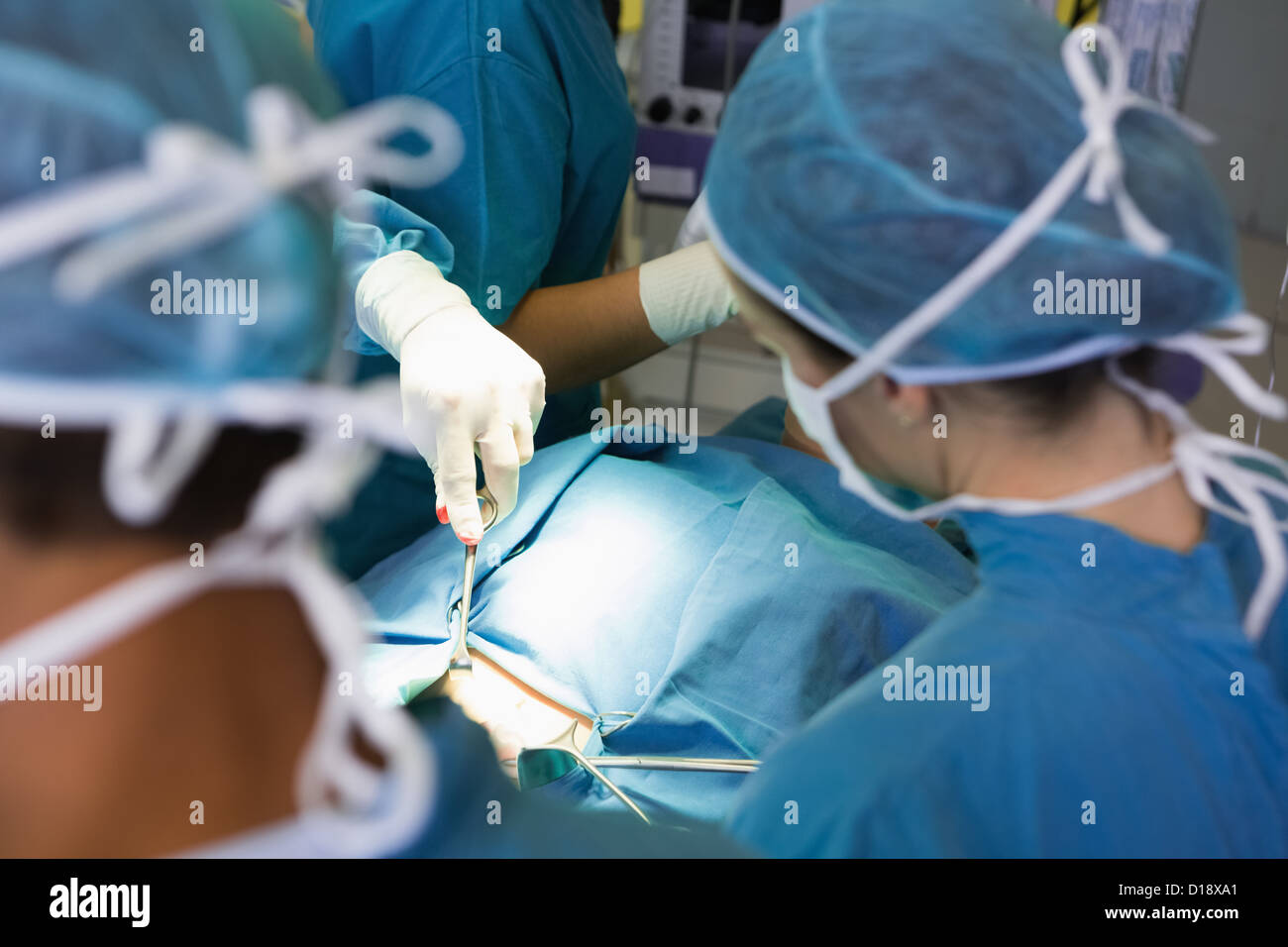 Operation being performed on a stomach Stock Photo - Alamy