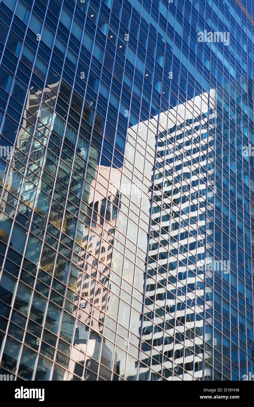 Other buildings reflected in skyscraper Stock Photo - Alamy