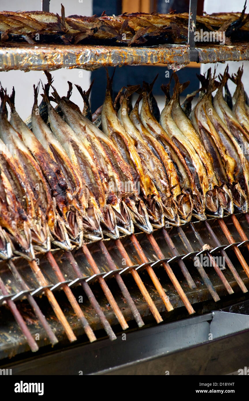 Steckerlfisch fish grilled on a stick at the oktoberfest hi-res stock ...