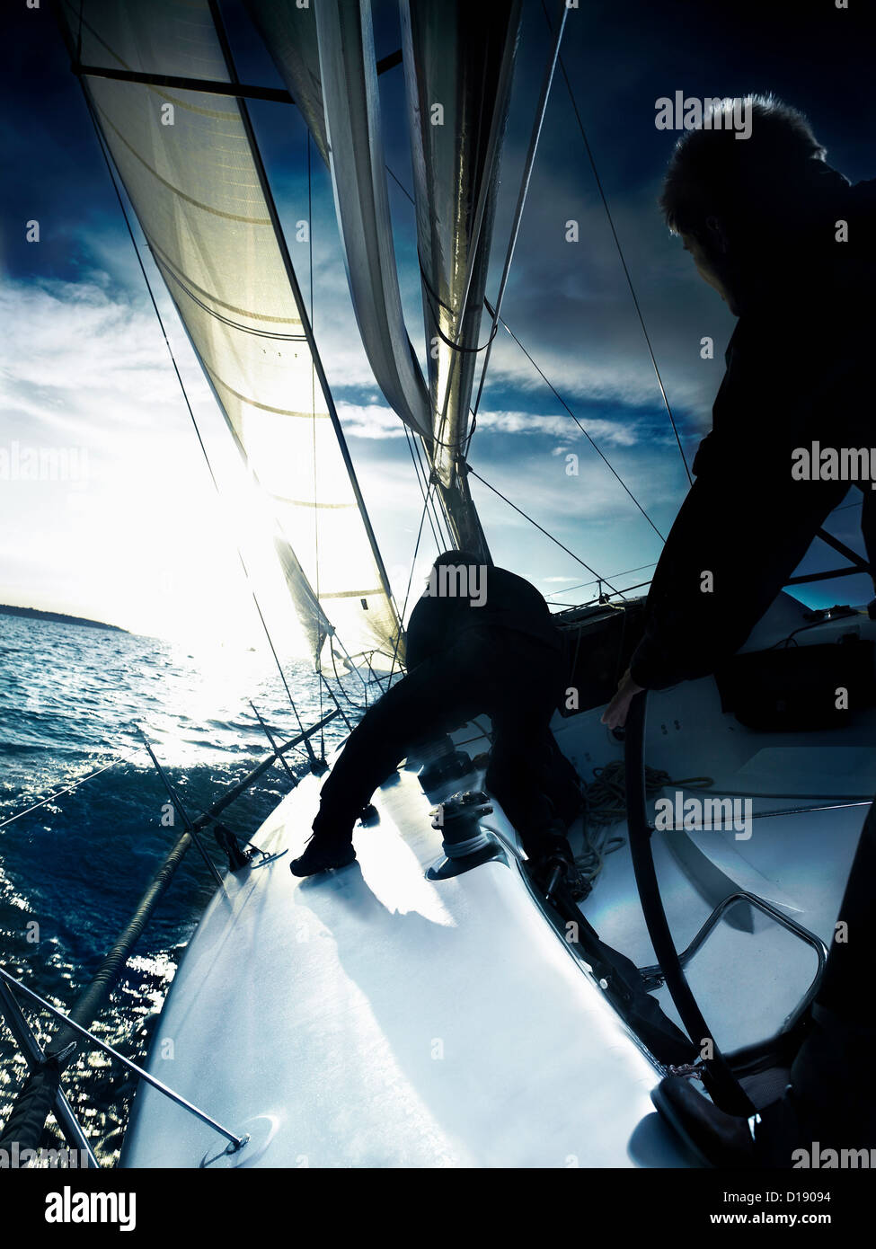 Two sailors on yacht Stock Photo - Alamy