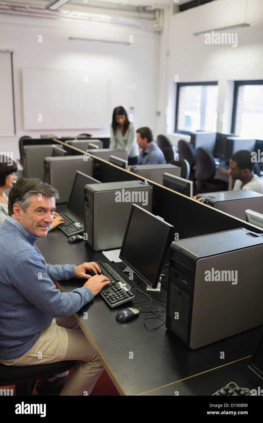 Man in computer class Stock Photo - Alamy