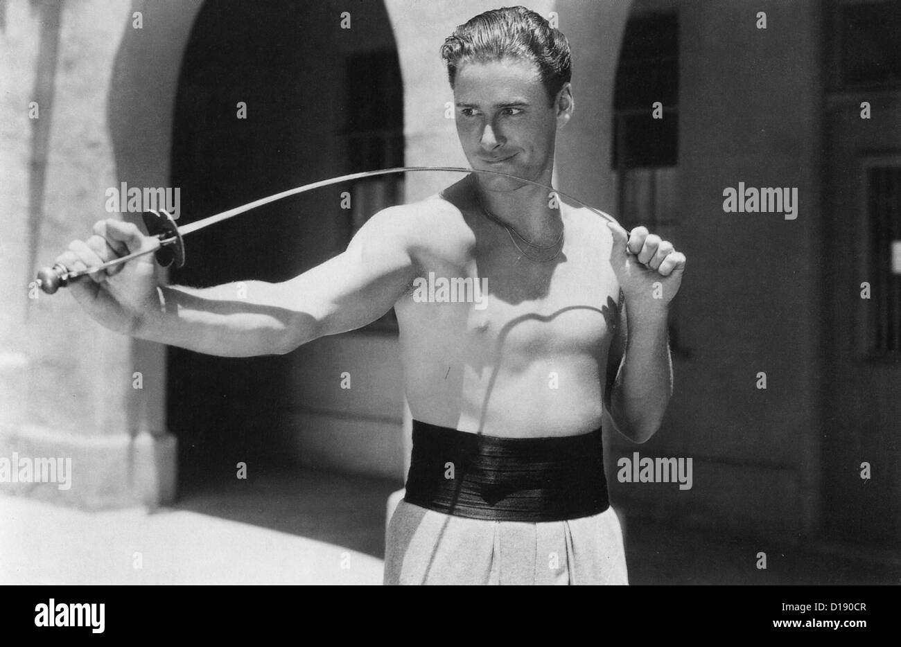 ERROLL FLYNN (1909-1959) US film actor about 1934 Stock Photo - Alamy