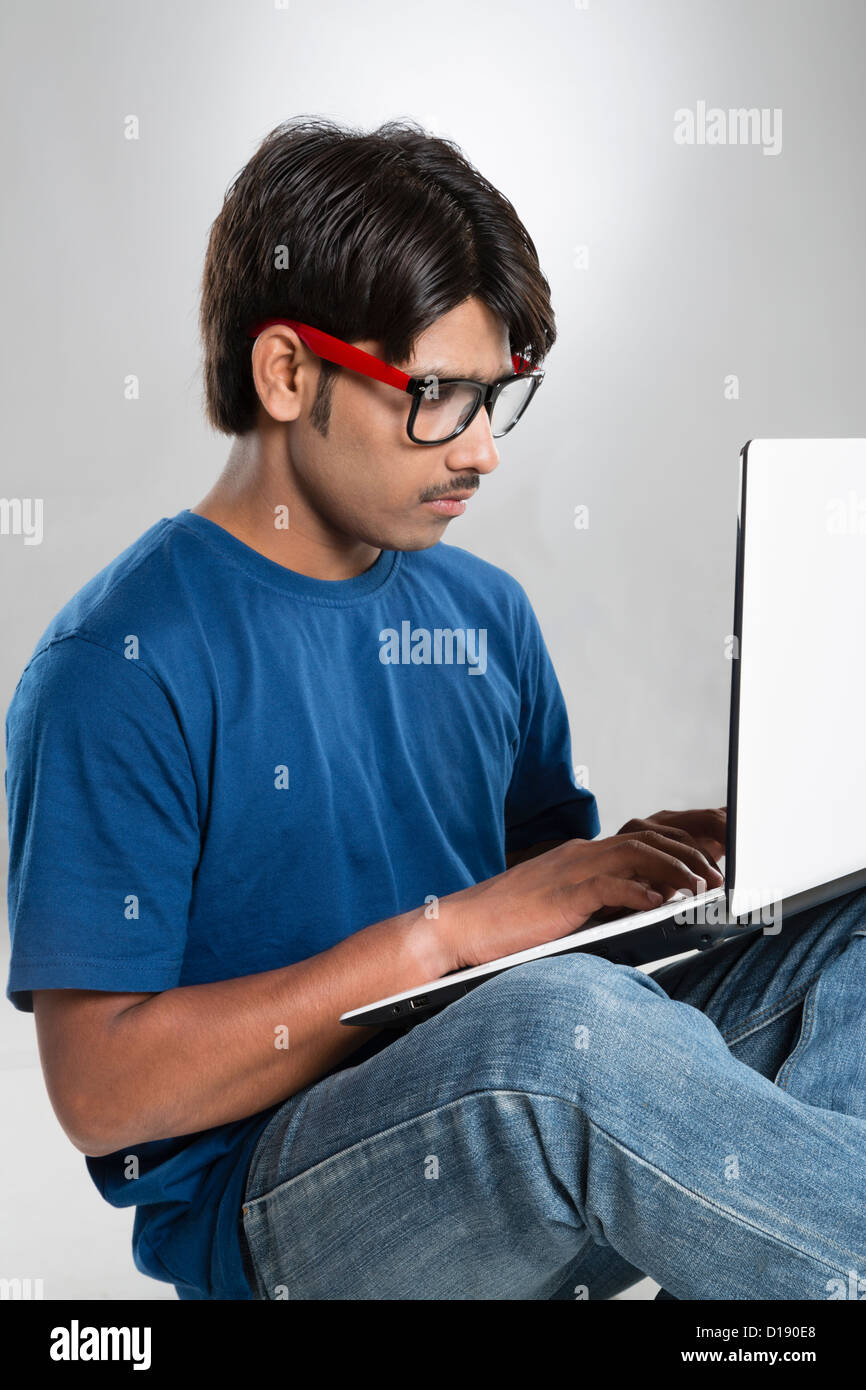 Man using a laptop Stock Photo - Alamy