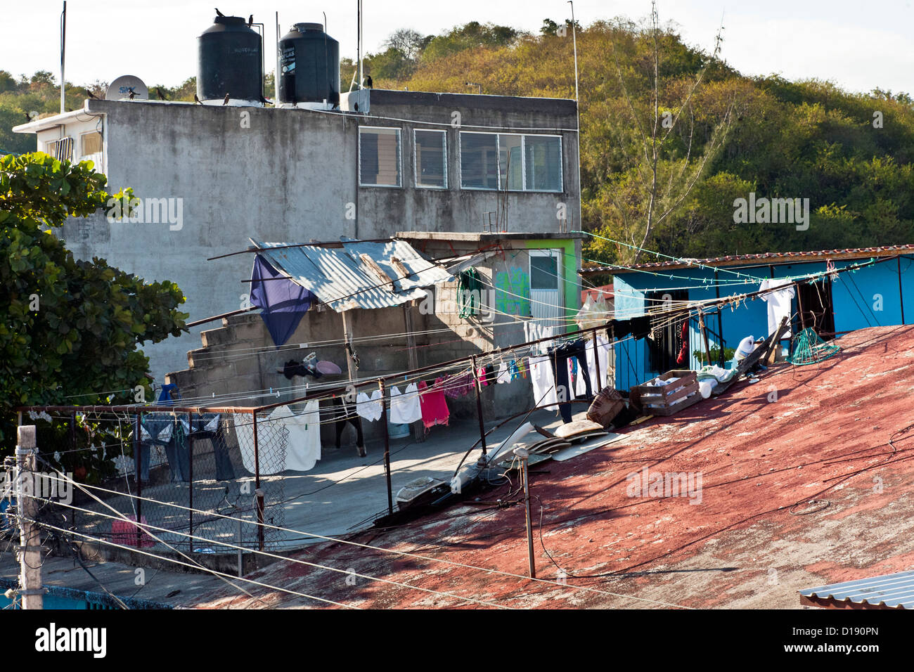 laundry drying on rooftop next to lean to covered with corrugated metal ...