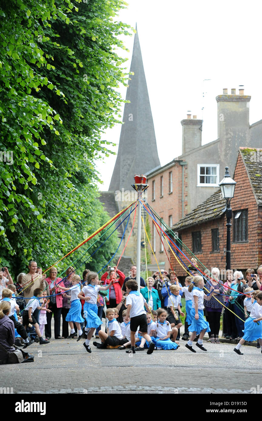 folk maypole dance dancers dancing street Stock Photo - Alamy