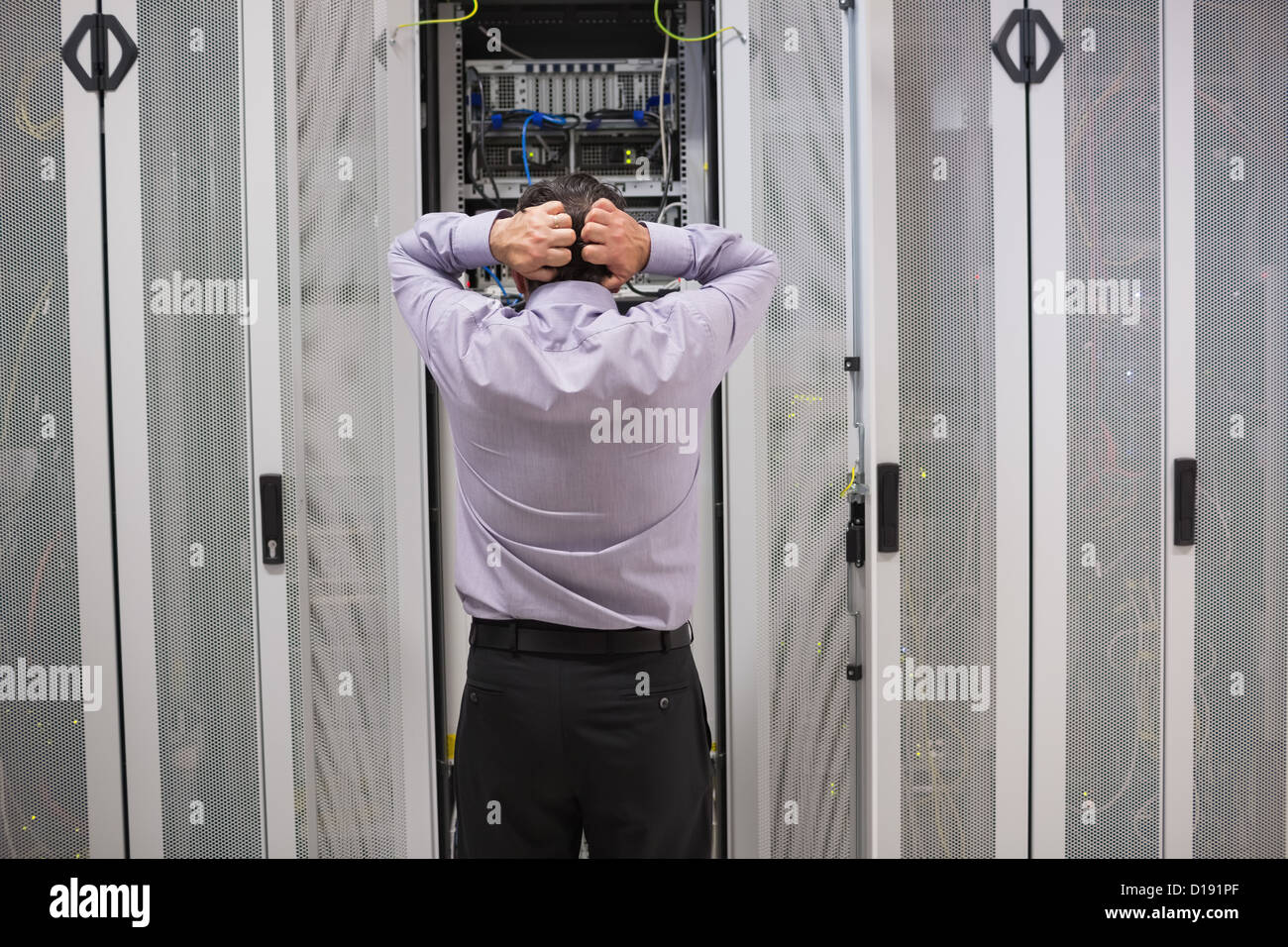 Technician getting stressed over server maintenance Stock Photo - Alamy