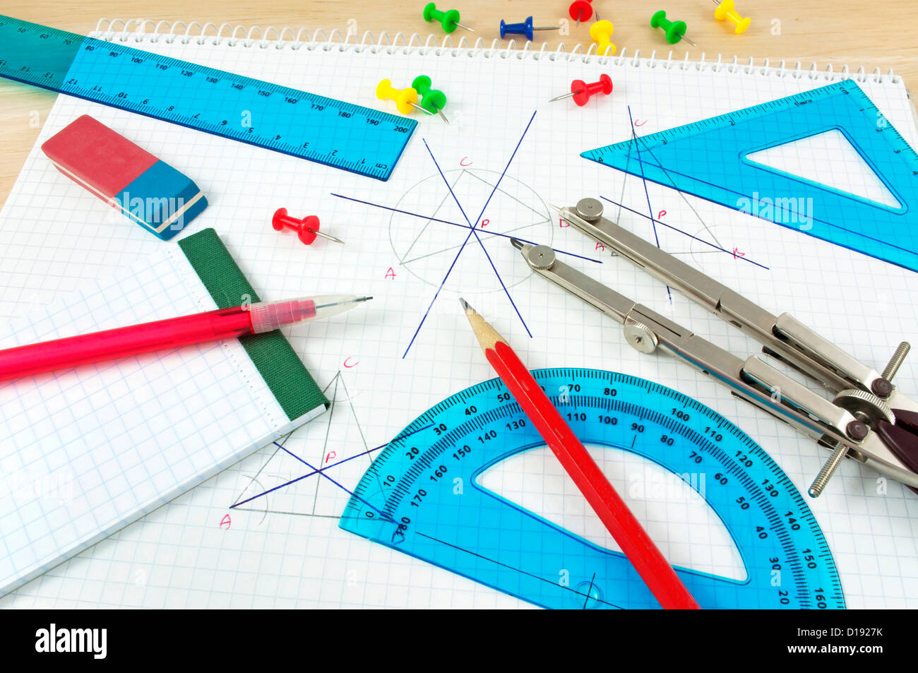 Geometry equipment on writing desk Stock Photo - Alamy