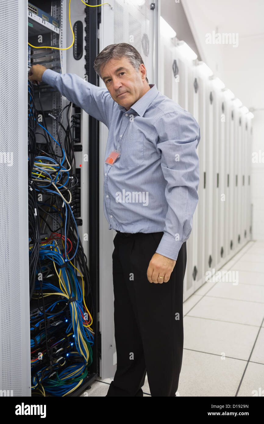 Technician working and repairing a server Stock Photo - Alamy