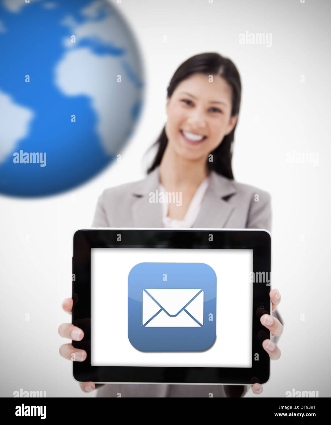 Businesswoman showing digital tablet showing mail symbol Stock Photo ...