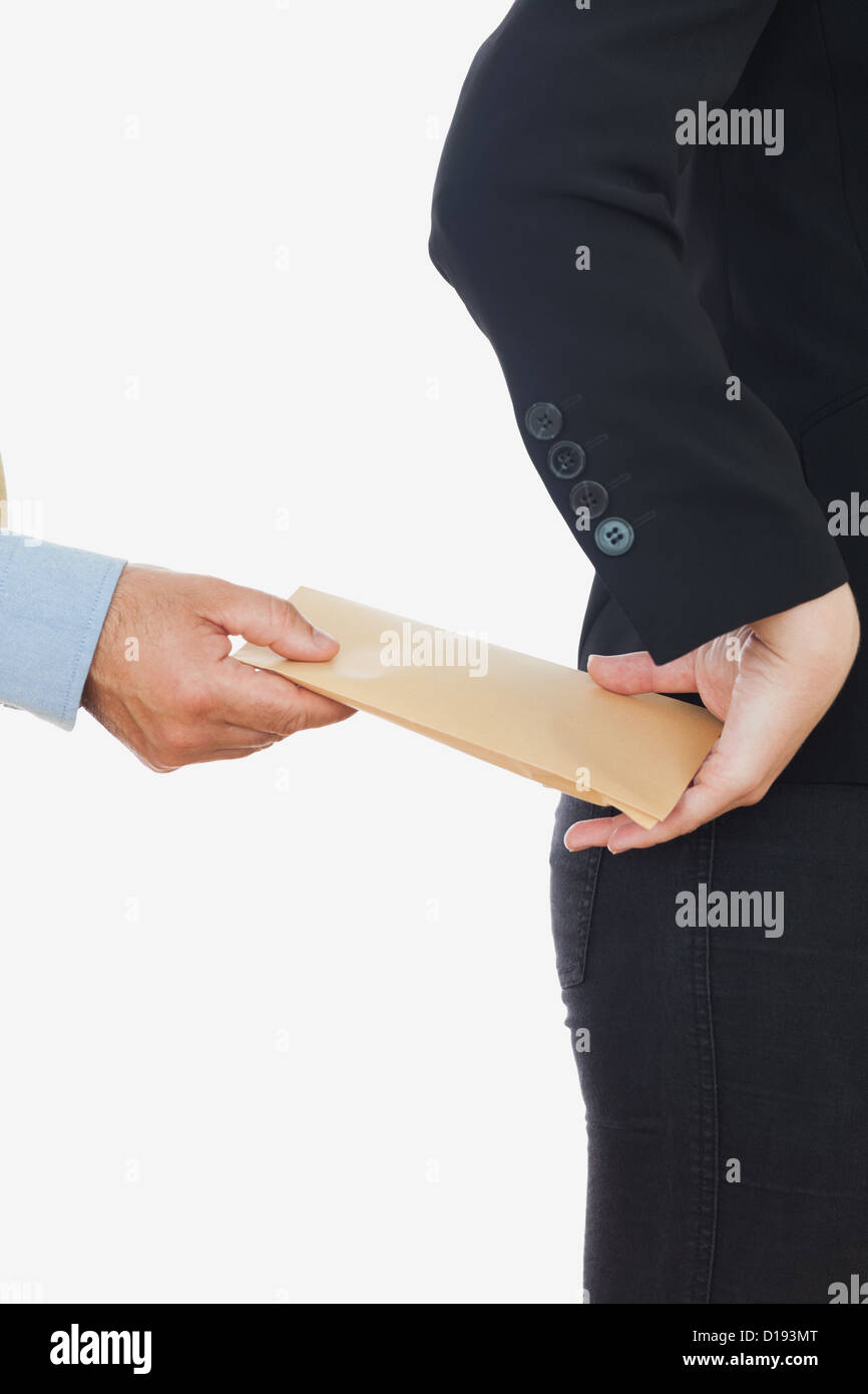 Woman bribing man envelope hi-res stock photography and images - Alamy