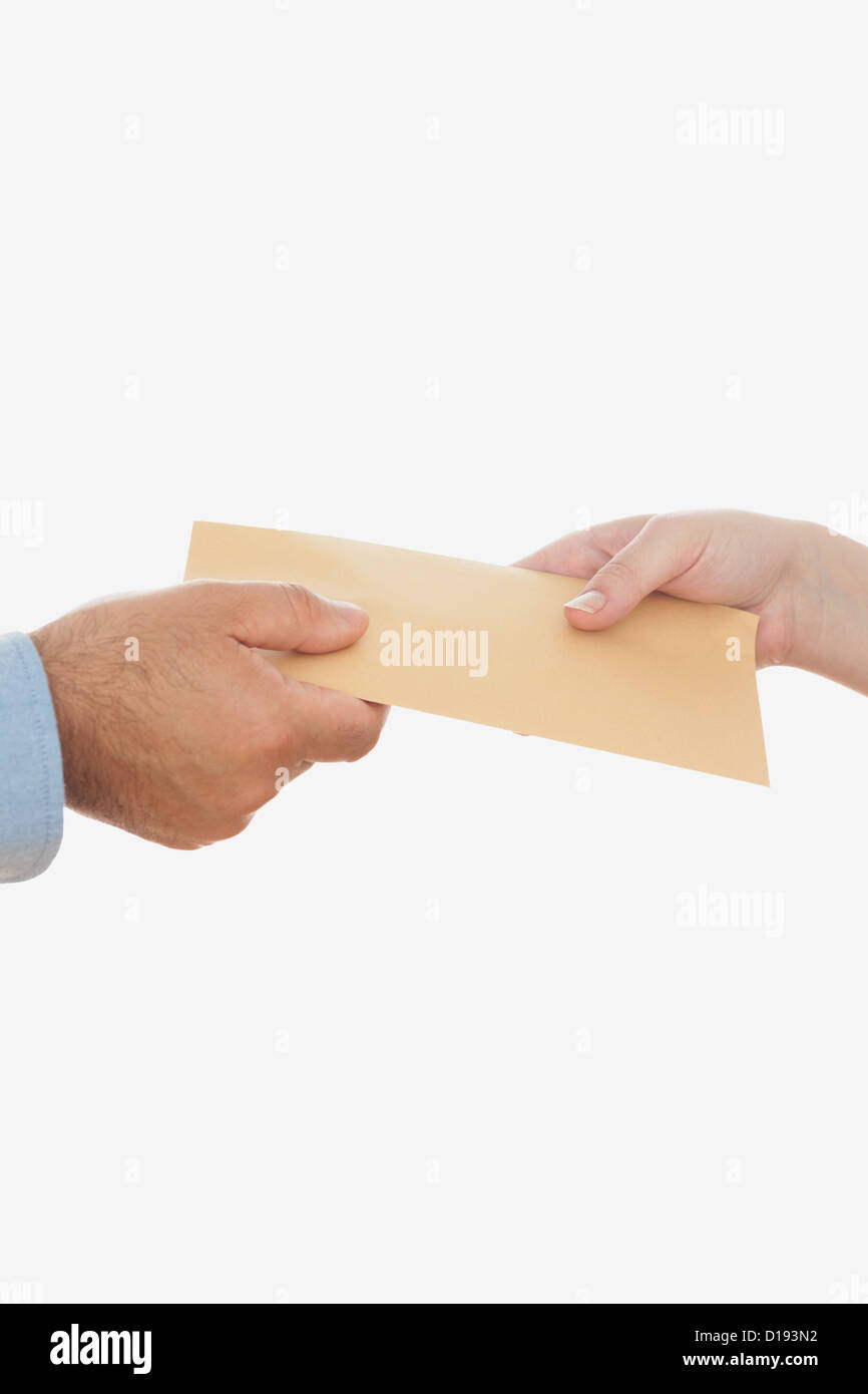 Business people holding envelope Stock Photo - Alamy
