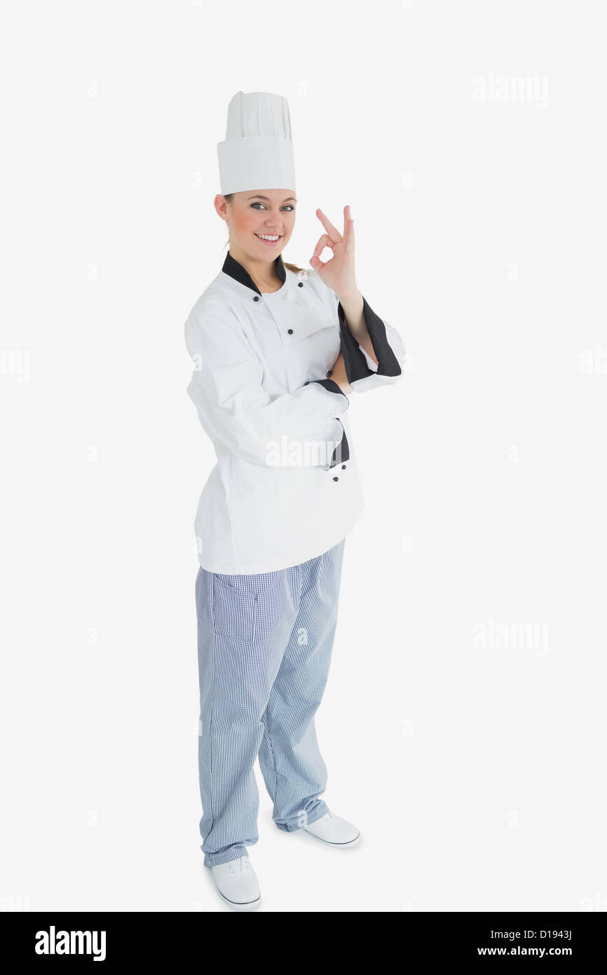 Portrait of female chef gesturing ok sign Stock Photo - Alamy
