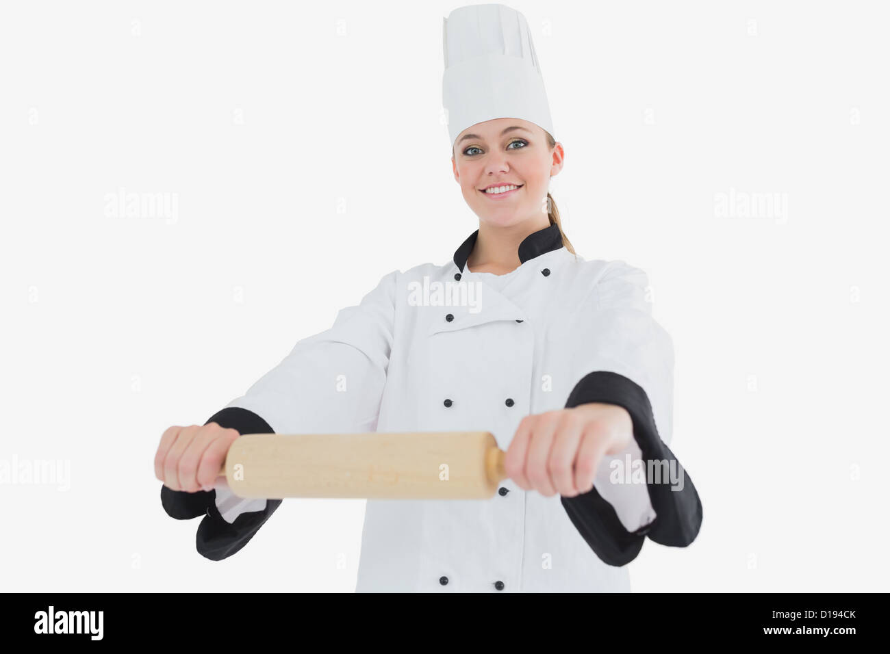 Happy female chef with rolling pin Stock Photo - Alamy