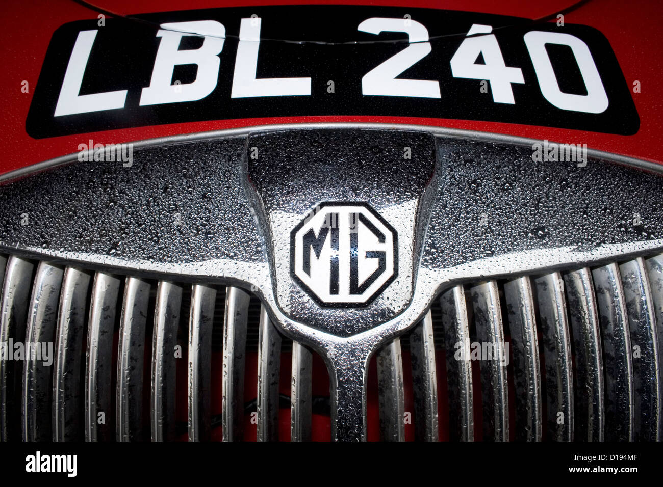 The chromed front grill and badge of a classic MG car Stock Photo - Alamy