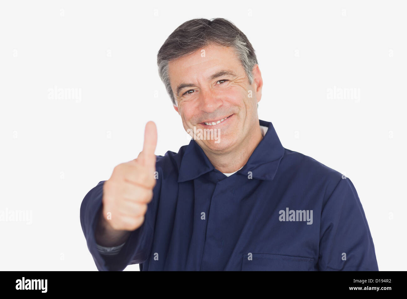Mechanic showing thumbs up sign Stock Photo - Alamy