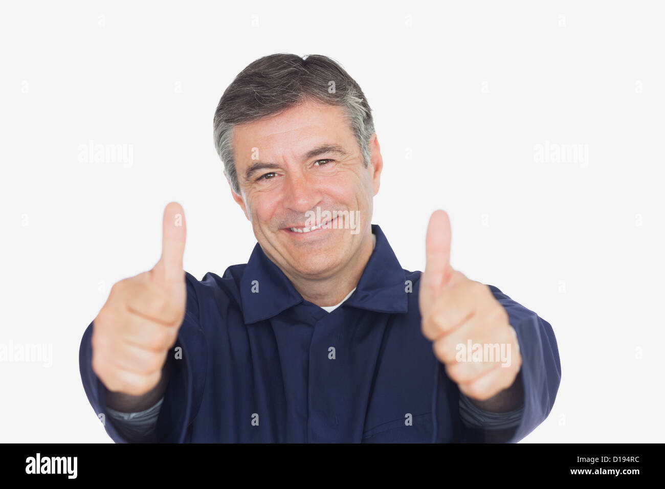 Mechanic gesturing thumbs up Stock Photo - Alamy