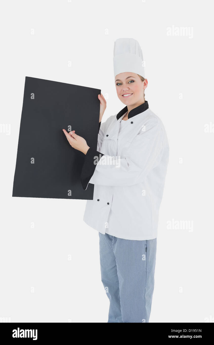 Standing pointing smiling uniform hat hi-res stock photography and ...