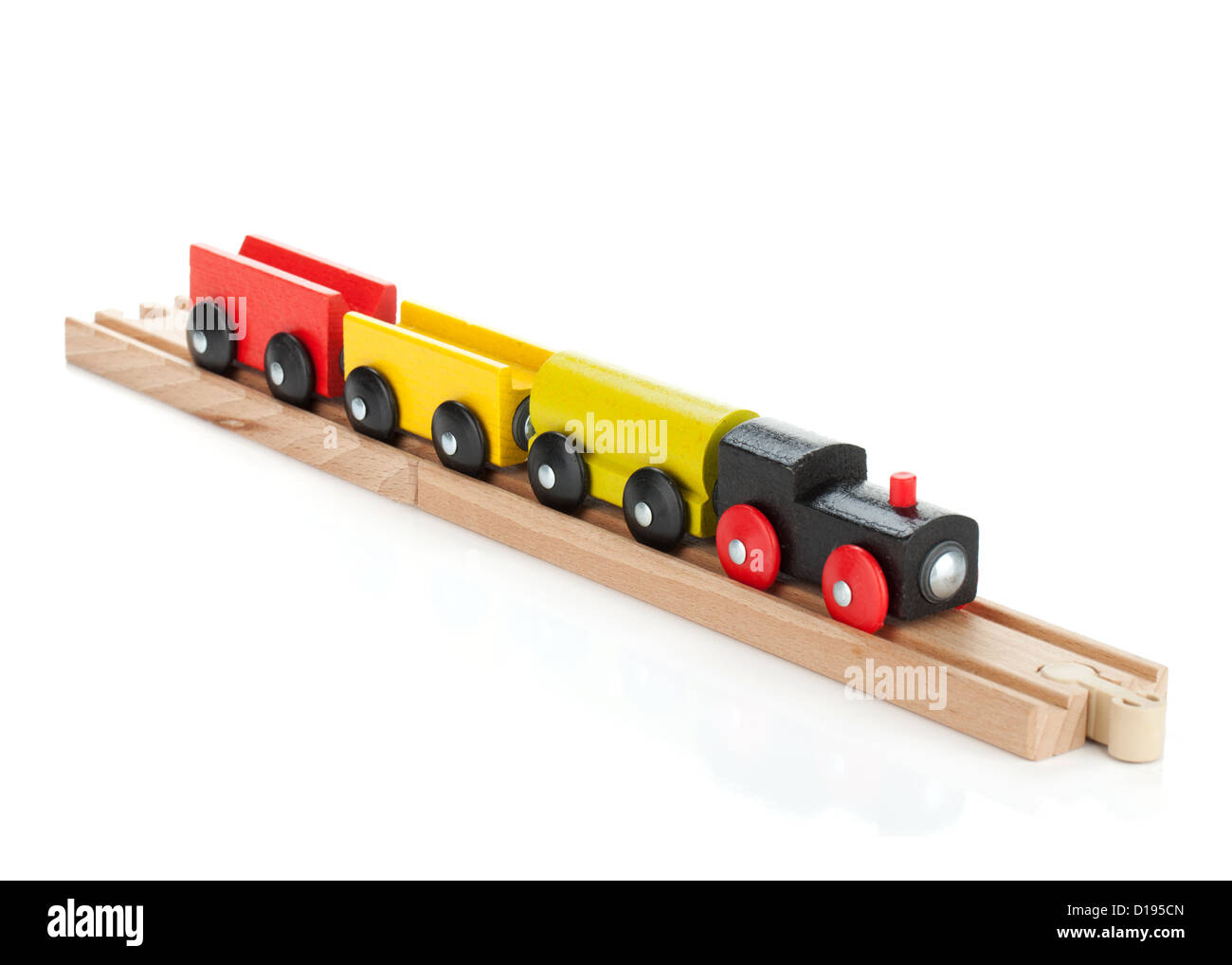 Wooden toy colored train. Isolated on white background Stock Photo - Alamy