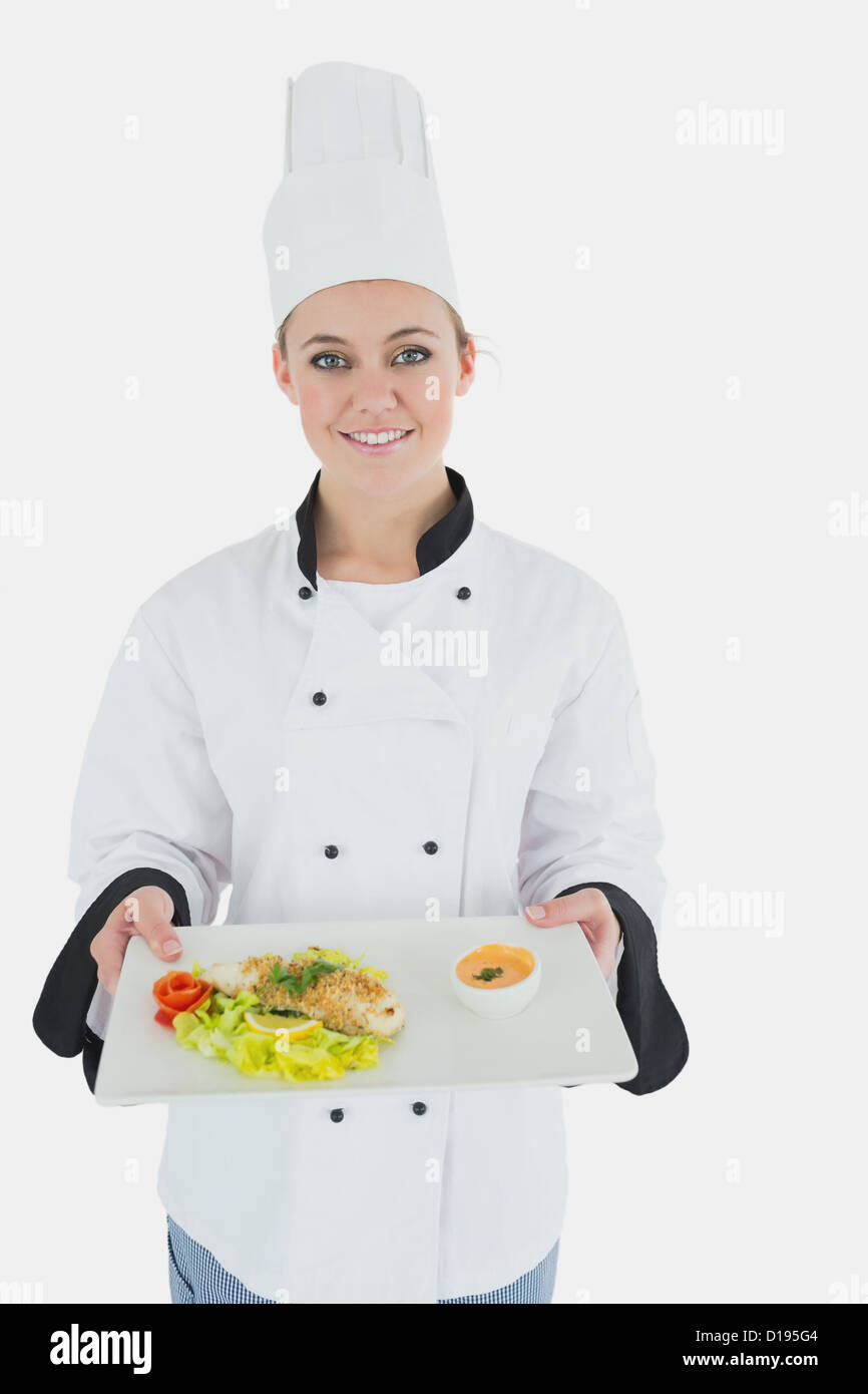 Female chef with healthy meal Stock Photo - Alamy