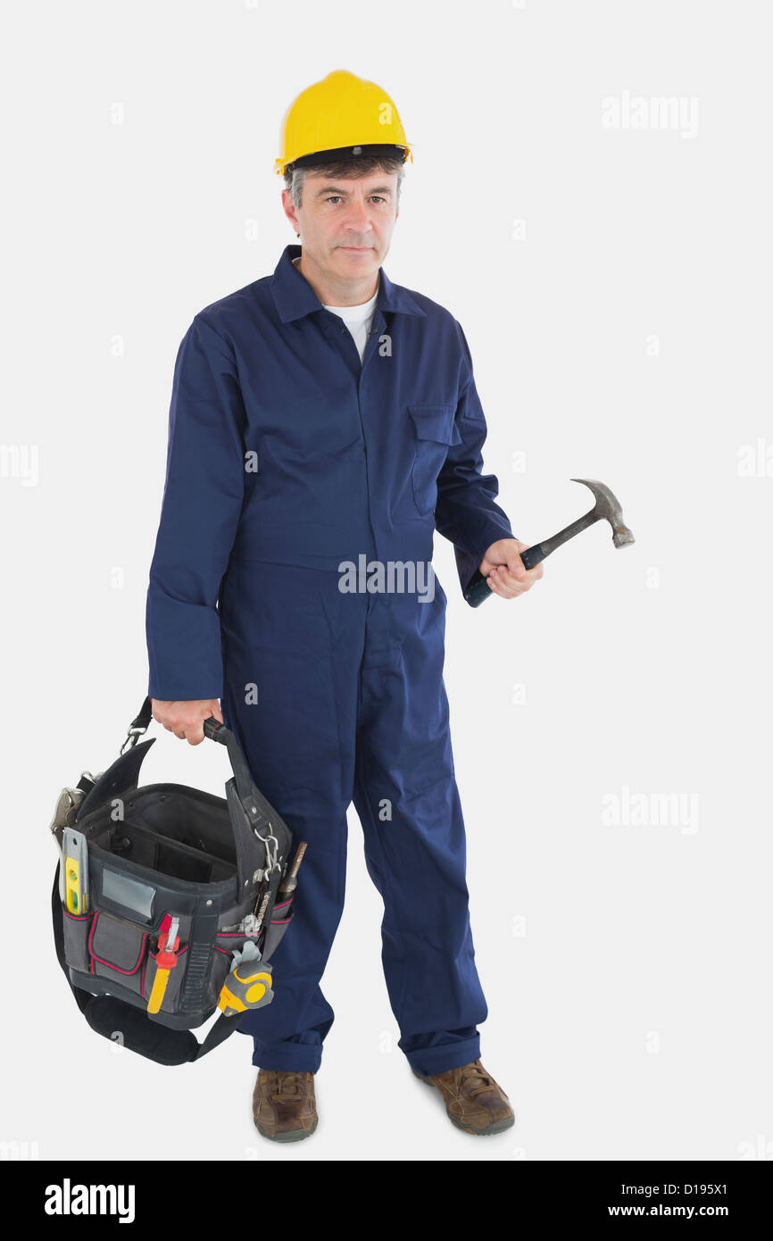 Mature mechanic carrying tool bag Stock Photo - Alamy