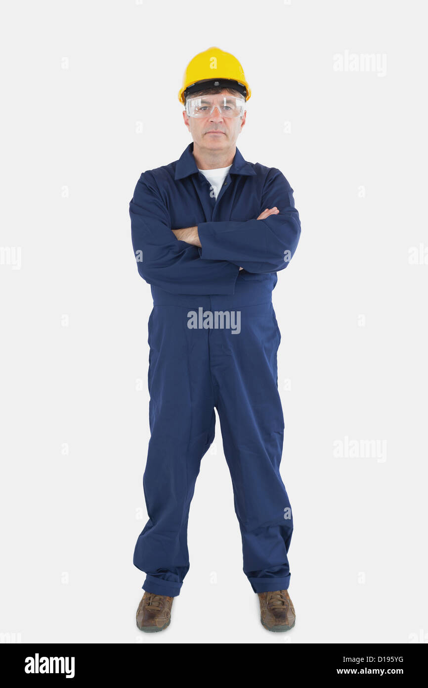 Confident technician wearing hardhat and eyewear Stock Photo - Alamy