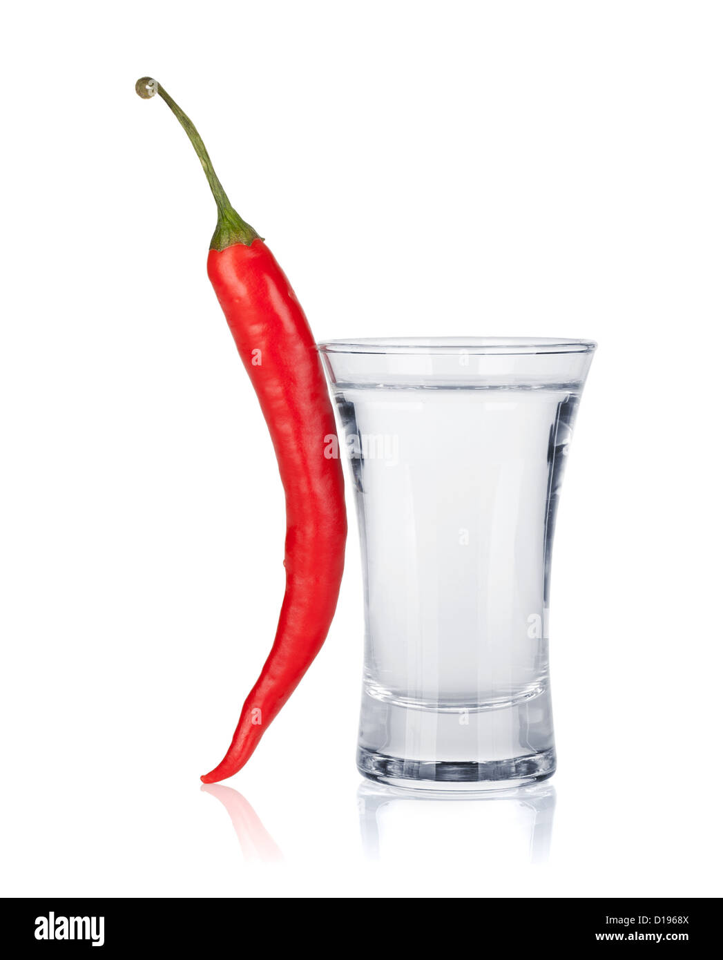 Shot of vodka and red hot chili pepper. Isolated on white background ...