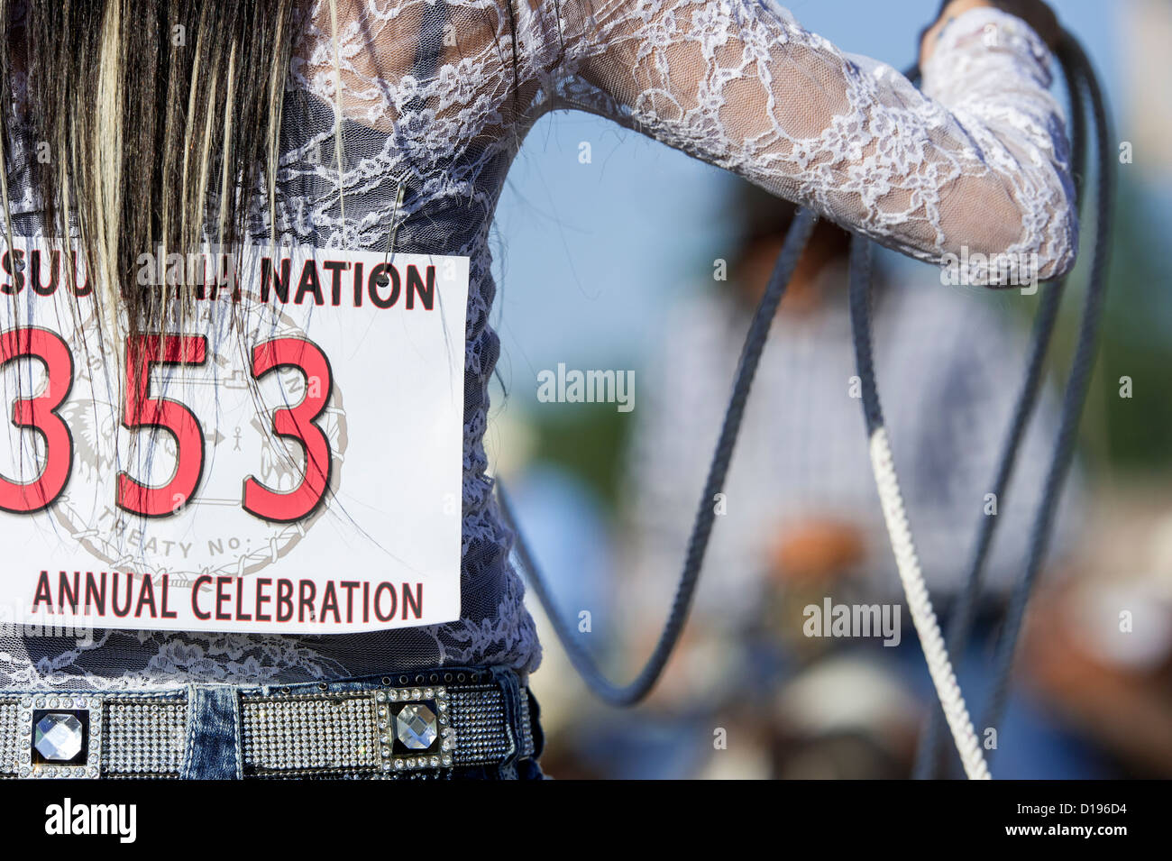 Young female roper the Tsuu T'ina Rodeo held every July, in Bragg Creek ...