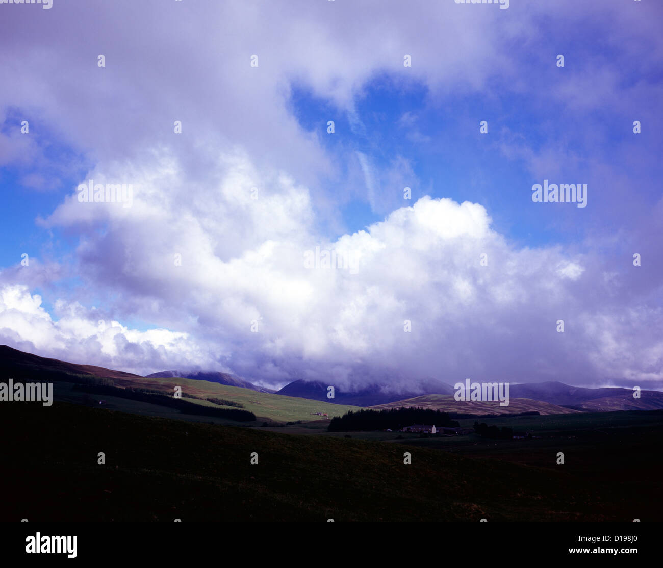 Storm clouds passing above Ben Vuirich Meall an Daimh and Ben Vrackie ...