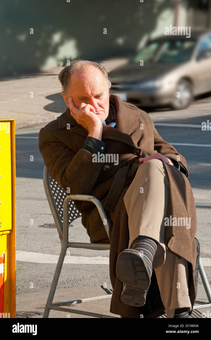 Old man sleeping chair hi-res stock photography and images - Alamy