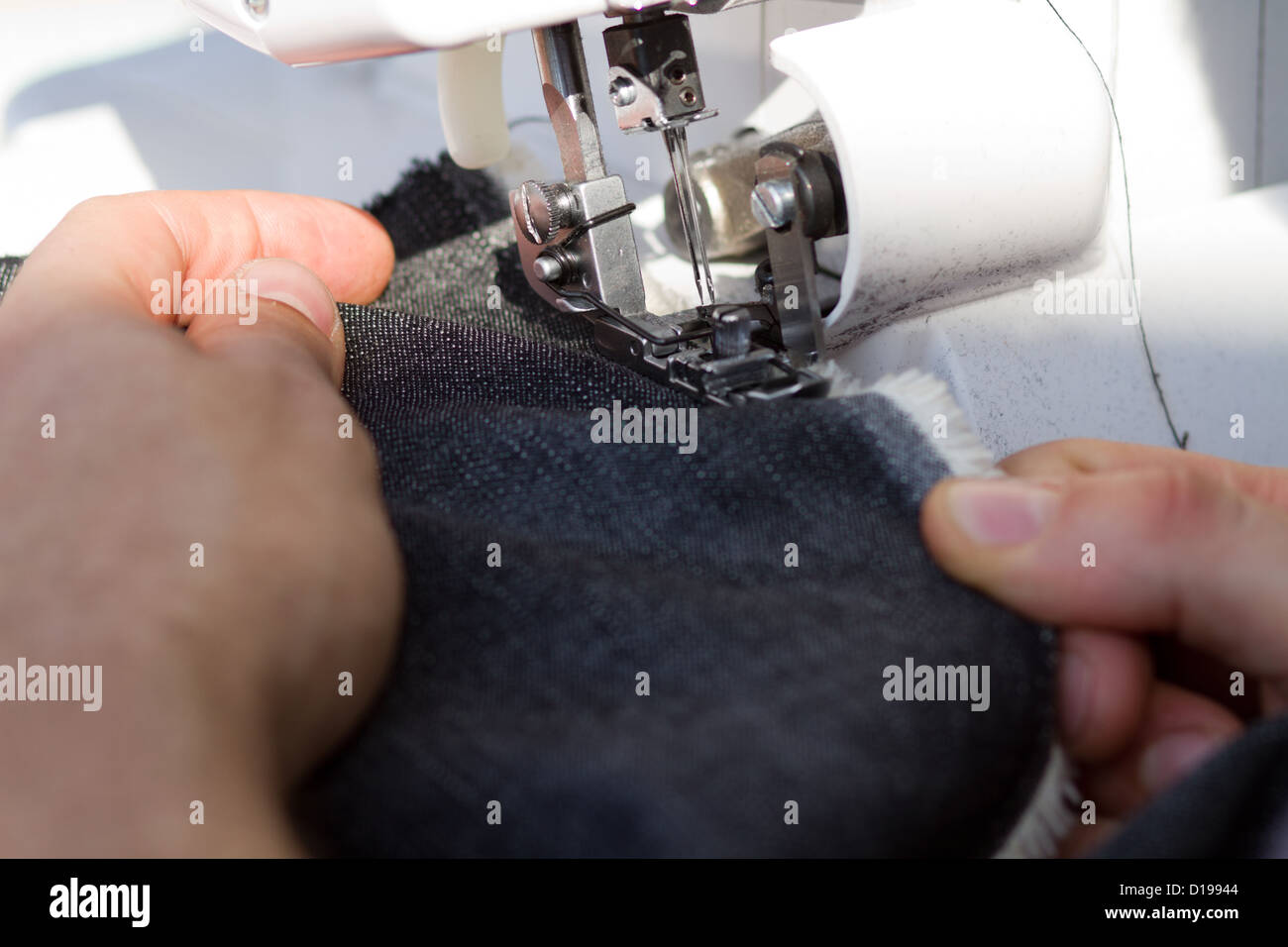 Closeup details of tailors work on a sewing machine. This is how ...