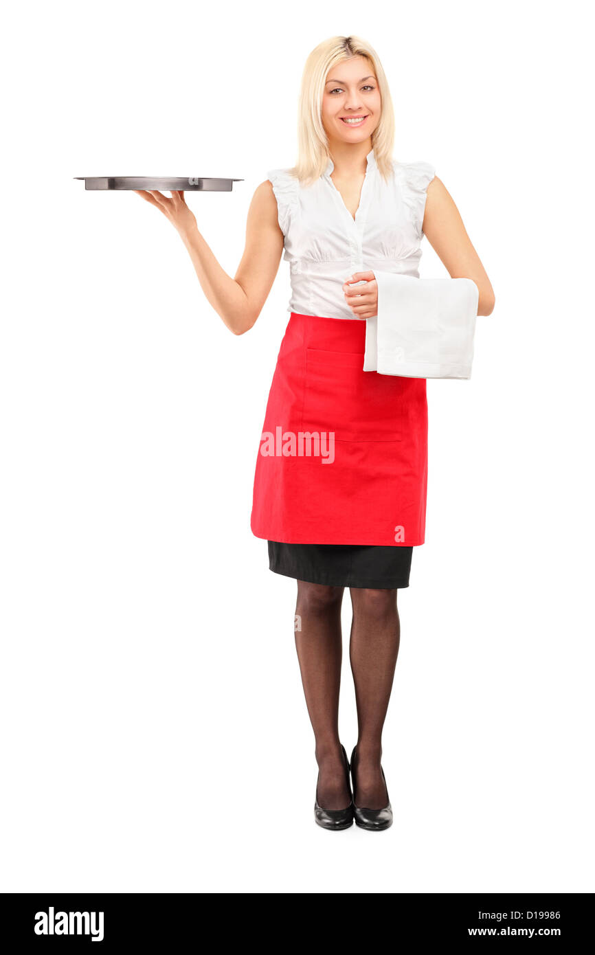 Full length portrait of a smiling female waitress holding a tray ...