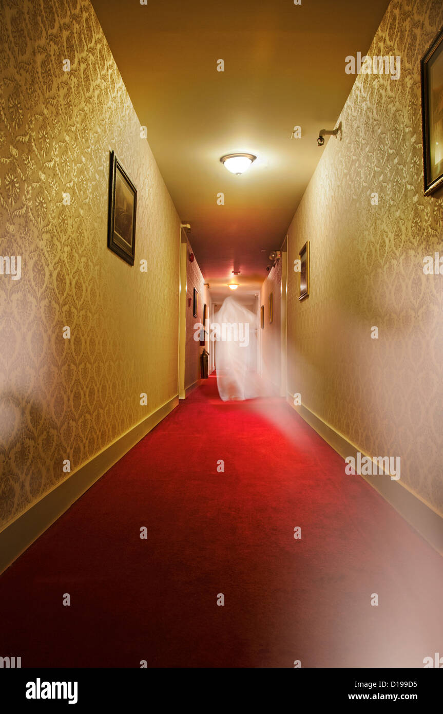Ghost walking in hotel hallway Stock Photo - Alamy