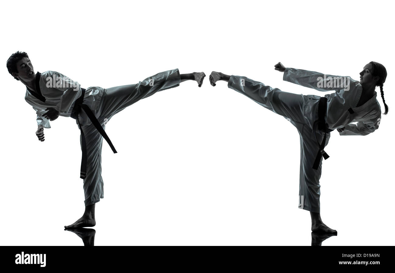 one couple man woman couple exercising karate taekwondo martial arts in ...