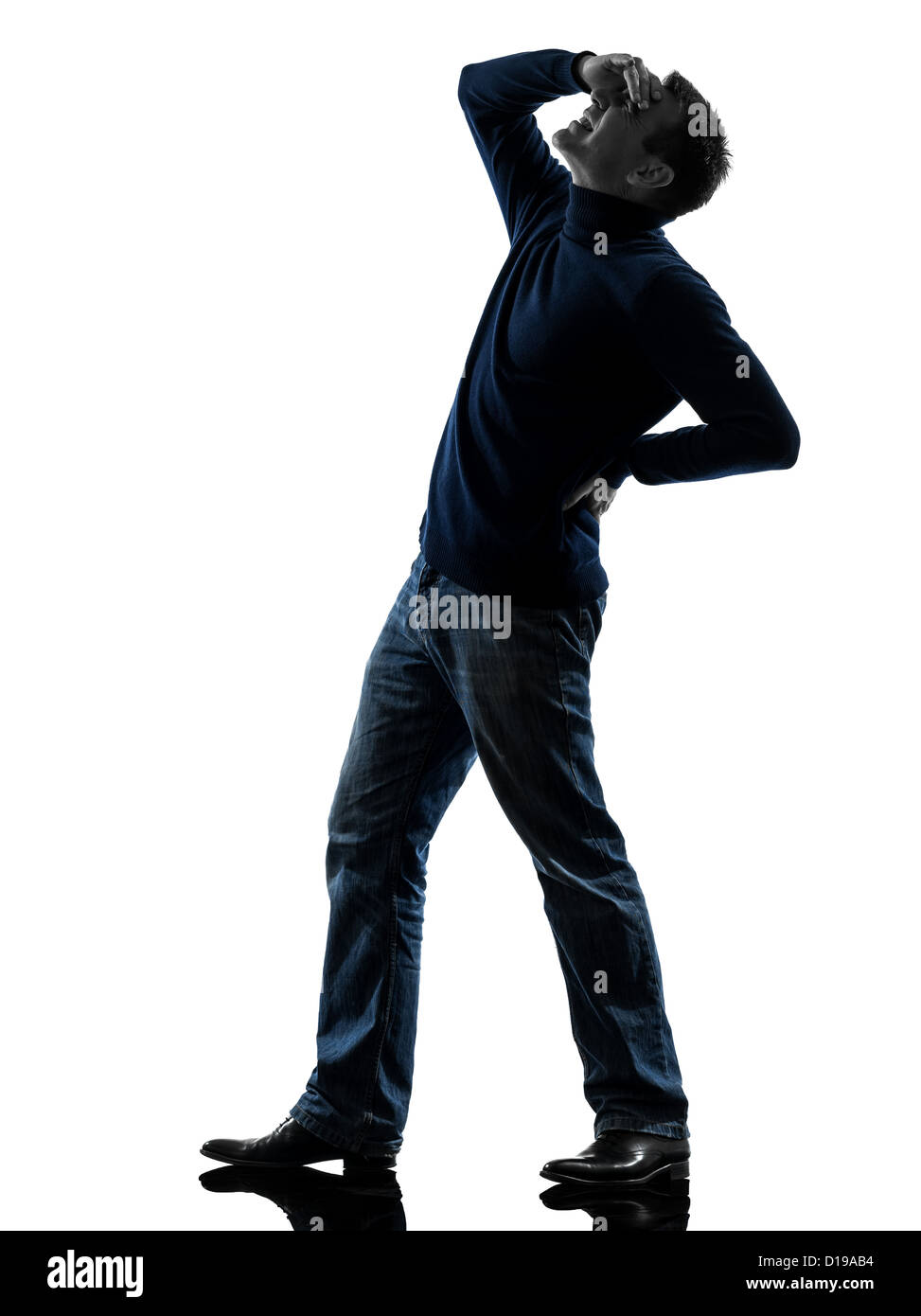 one man full length in silhouette studio isolated on white background ...