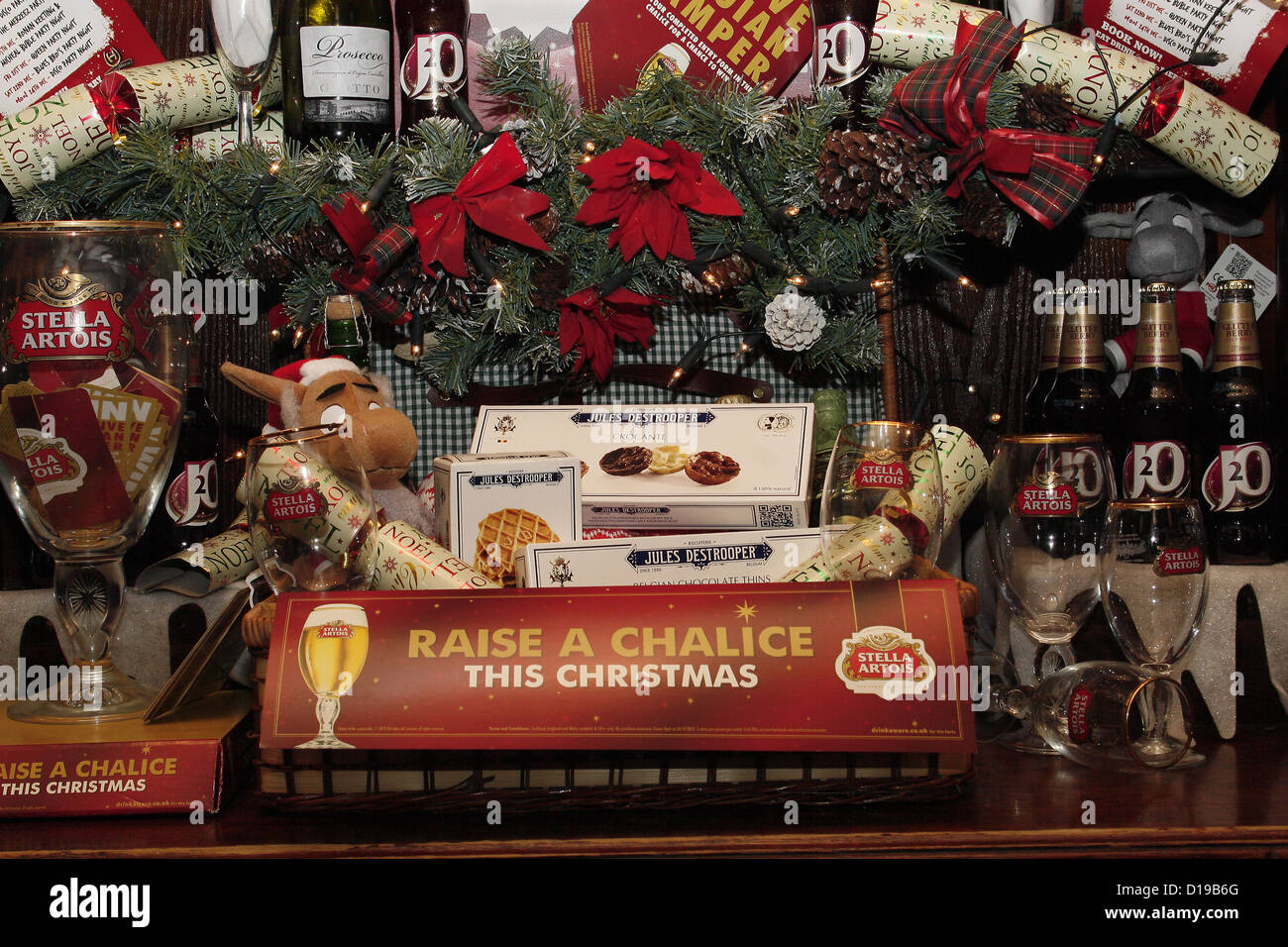 display of stella artois hamper behind bar of pub Stock Photo - Alamy