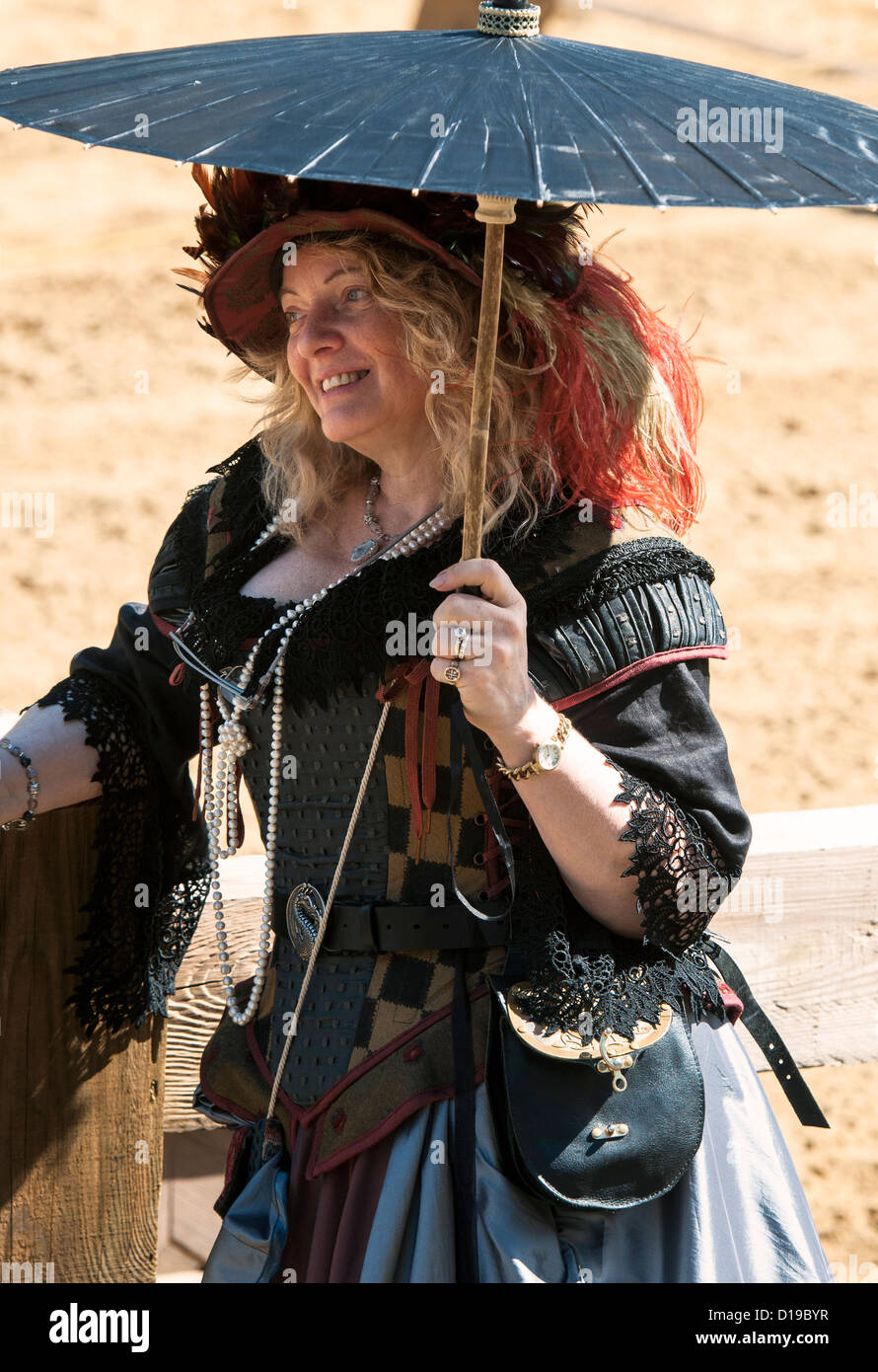 Old lady with umbrella hi-res stock photography and images - Alamy