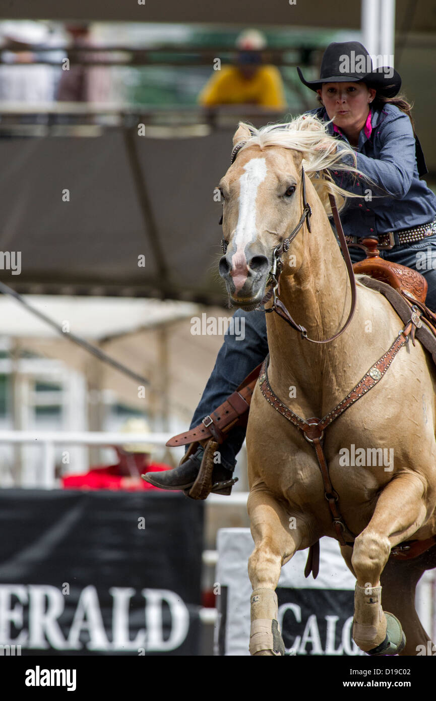 Ladies barrel racing calgary stampede hi-res stock photography and ...