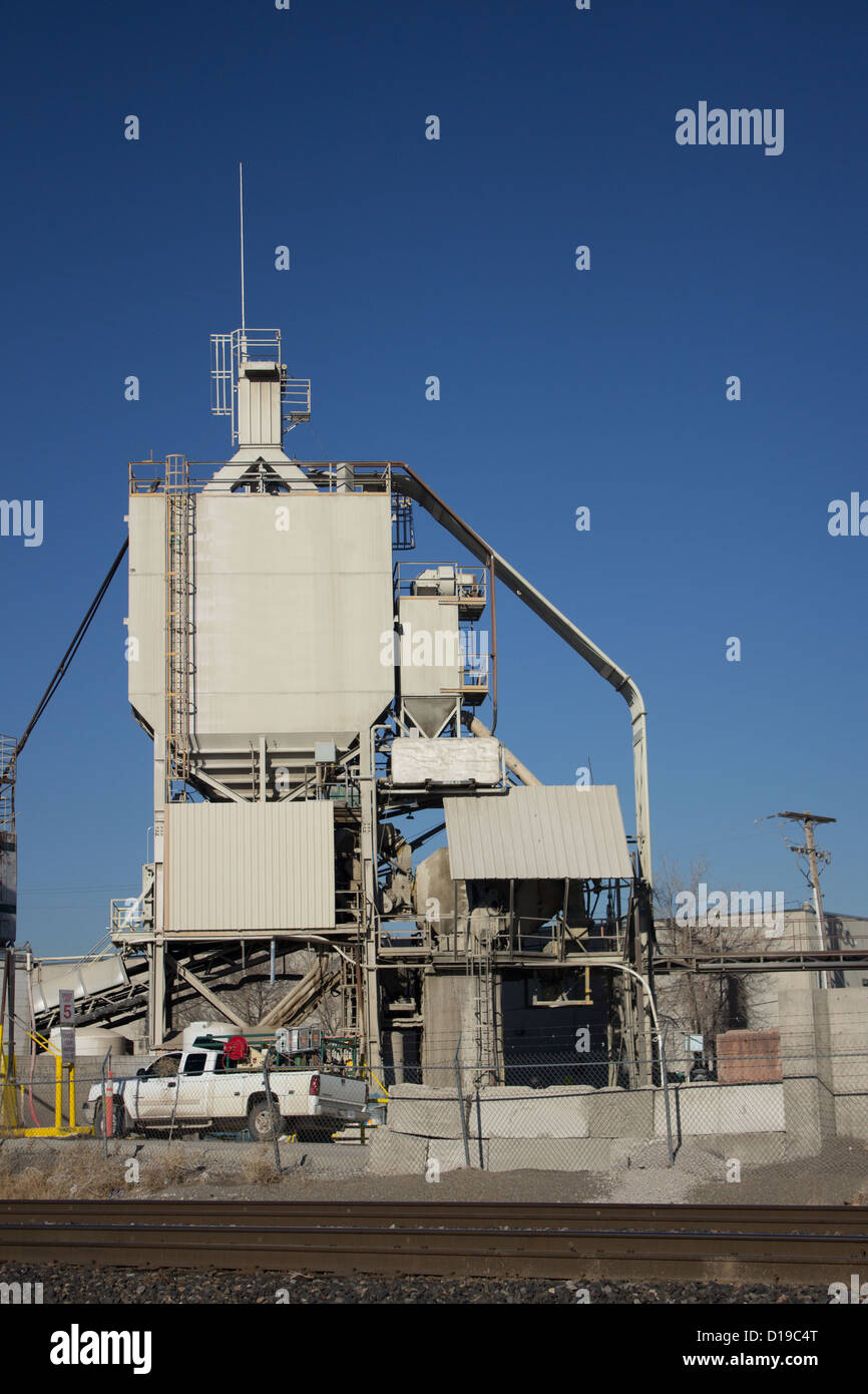 a Cement factory with blue skies Stock Photo - Alamy