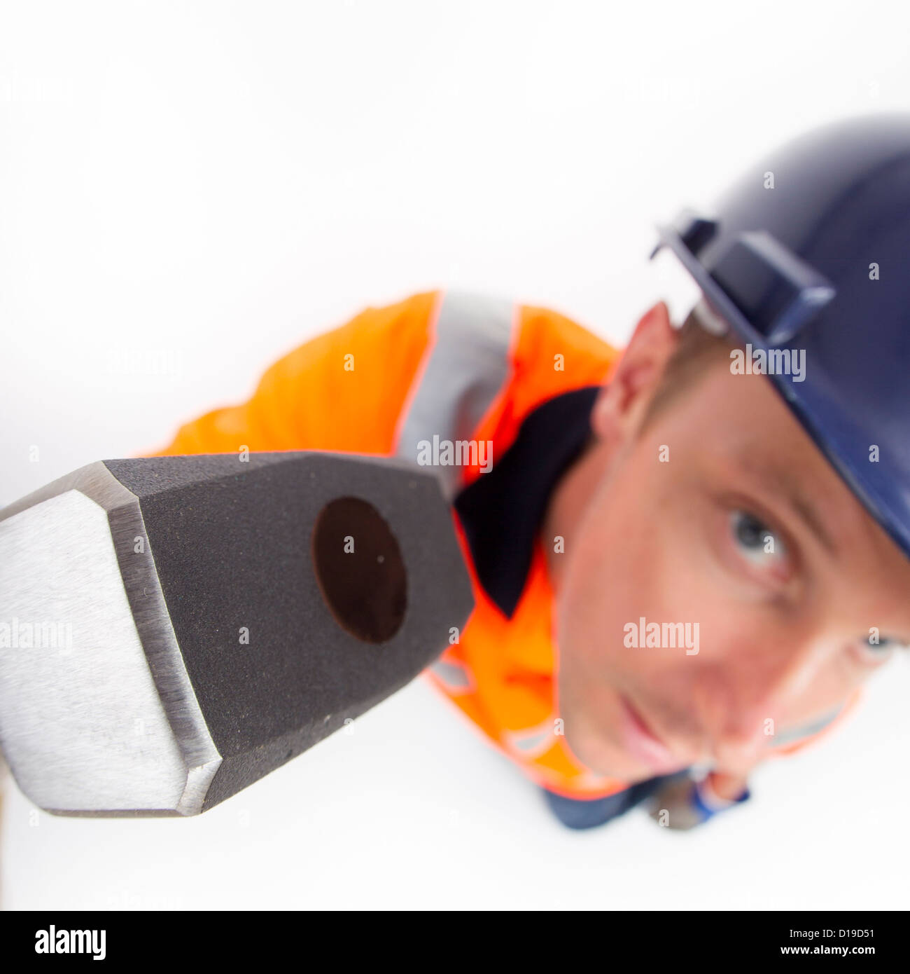 Man holding hammer Stock Photo - Alamy