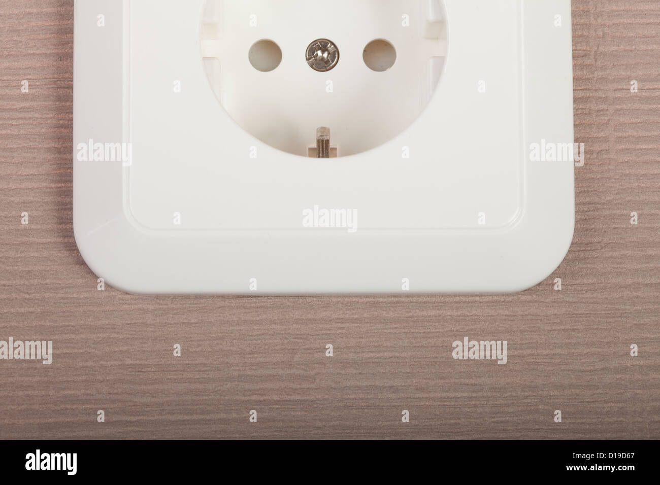White outlet on textured background Stock Photo - Alamy