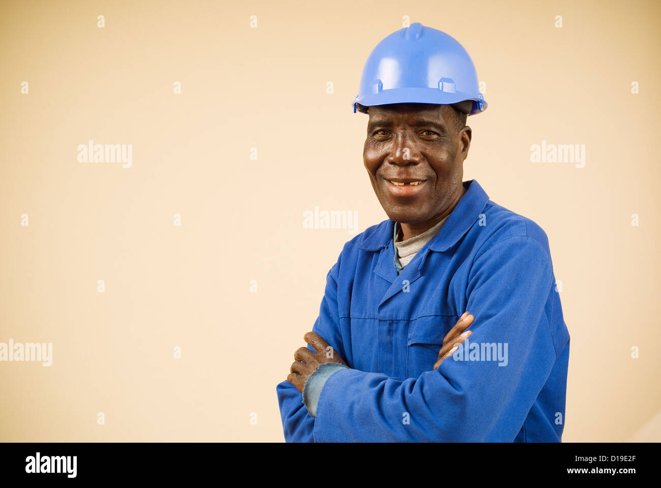 Close up of happy african construction worker, plumber, electrician ...