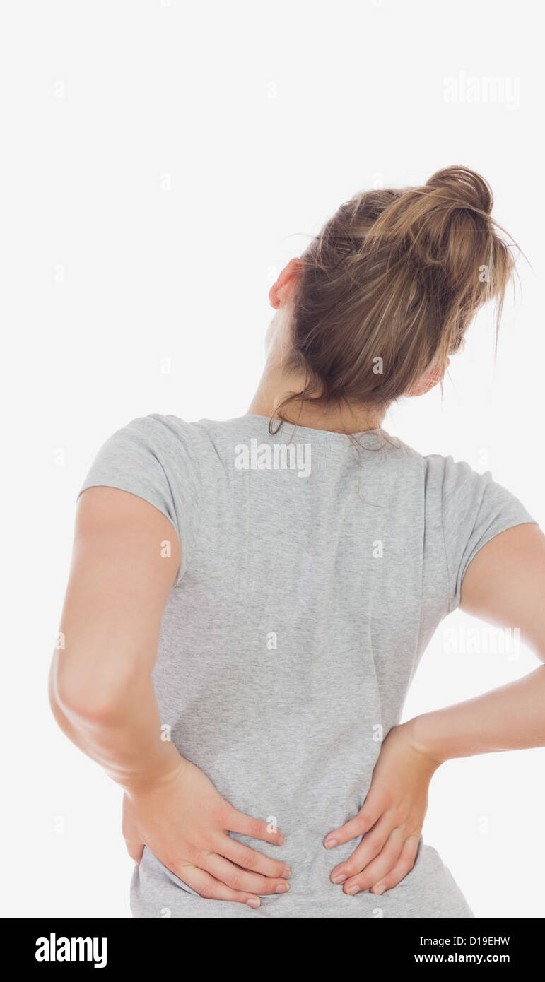 Woman suffering from backache Stock Photo - Alamy