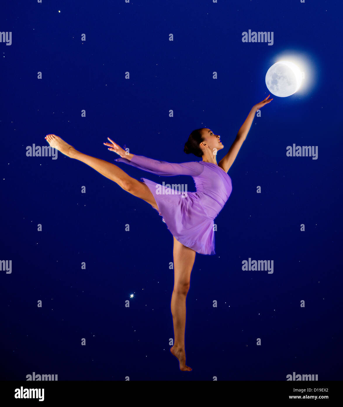 Ballerina reaching for the moon Stock Photo - Alamy