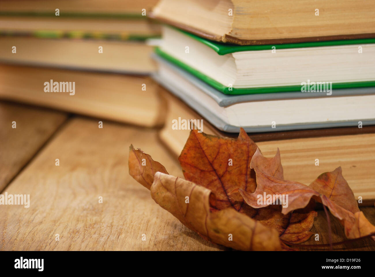 Many books on the wooden table Stock Photo - Alamy