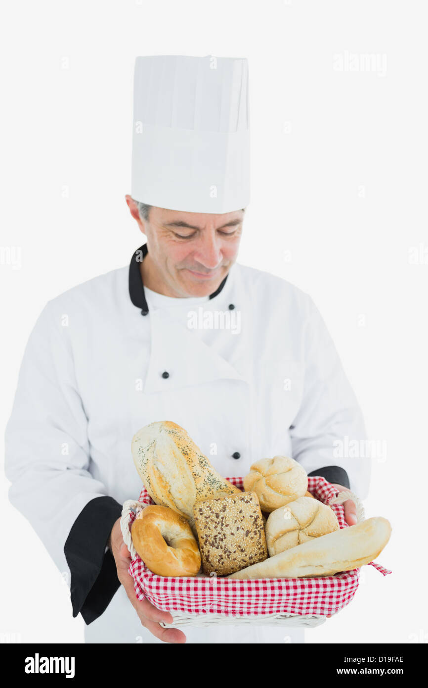 Male chef with bread basket Stock Photo - Alamy