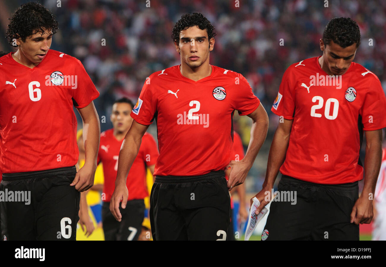 CAIRO, EGYPT: Egypt players Ahmed Hegazy (6), Salah Soliman (2) and Hussam Arafat (20) get set ...