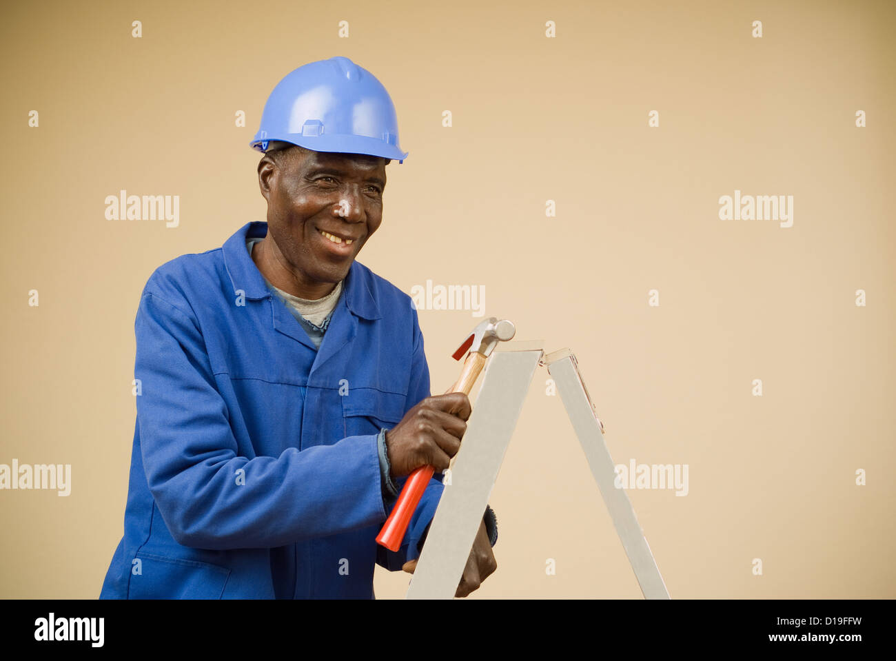 Close up construction worker climbing ladder hi-res stock photography ...