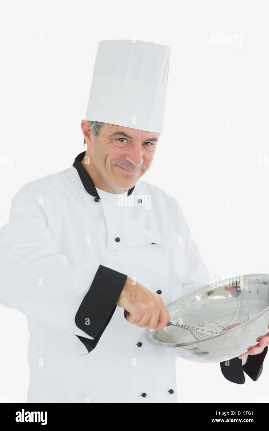 Chef with whisk and bowl Stock Photo - Alamy