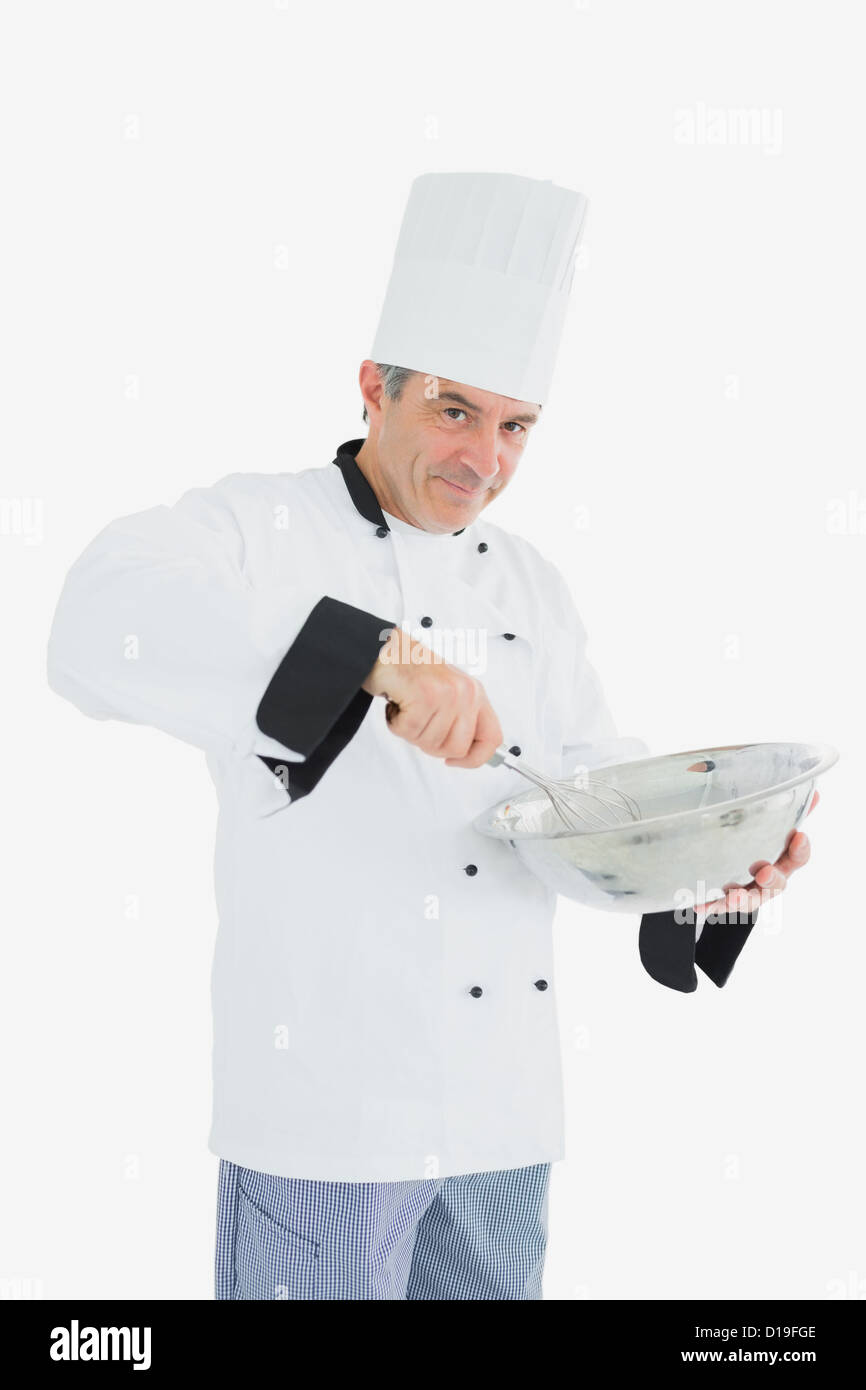 Chef mixing ingredients in bowl Stock Photo - Alamy